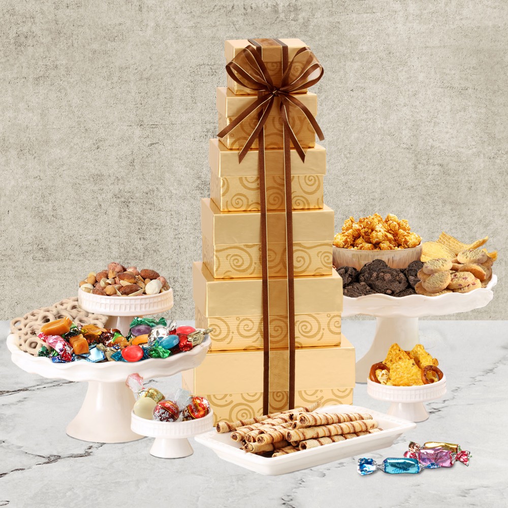 Buy our glittering gold holiday gift tower at broadwaybasketeers.com